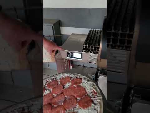 part 1 smoking pizza on a recteq 1250 with Lodge cast iron pizza "stone"