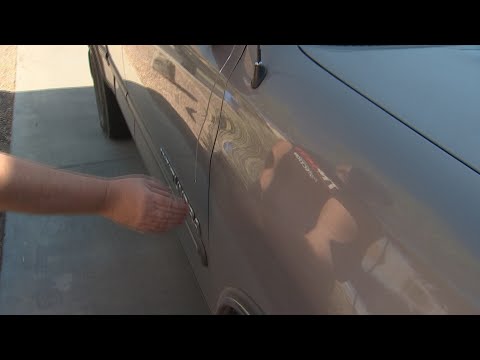 A Peoria police officer is in trouble after a fight with his neighbor