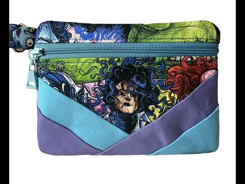 I made a cute clutch on my Janome 500e embroidery machine! Making the Wendy Clutch!