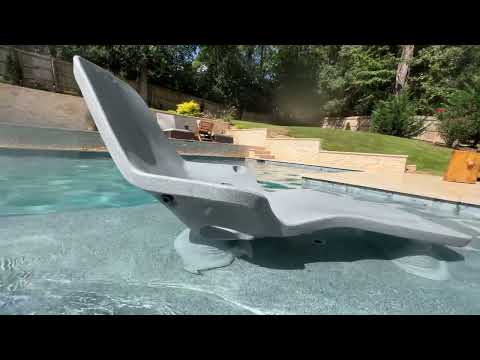 Tenjam Shayz In-Pool Lounger - 8" Risers shown in 9" water depth. Gray Granite Color