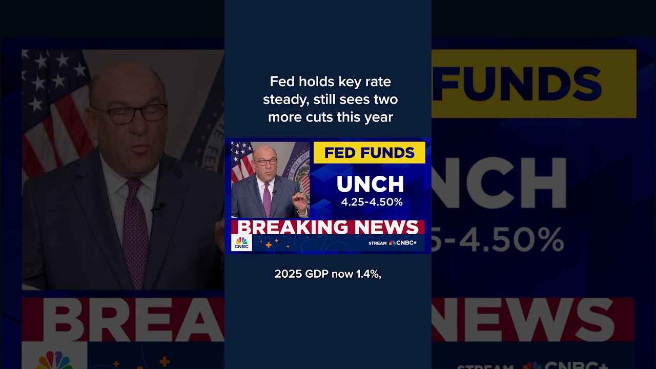 Fed holds key rate steady, still sees two more cuts this year