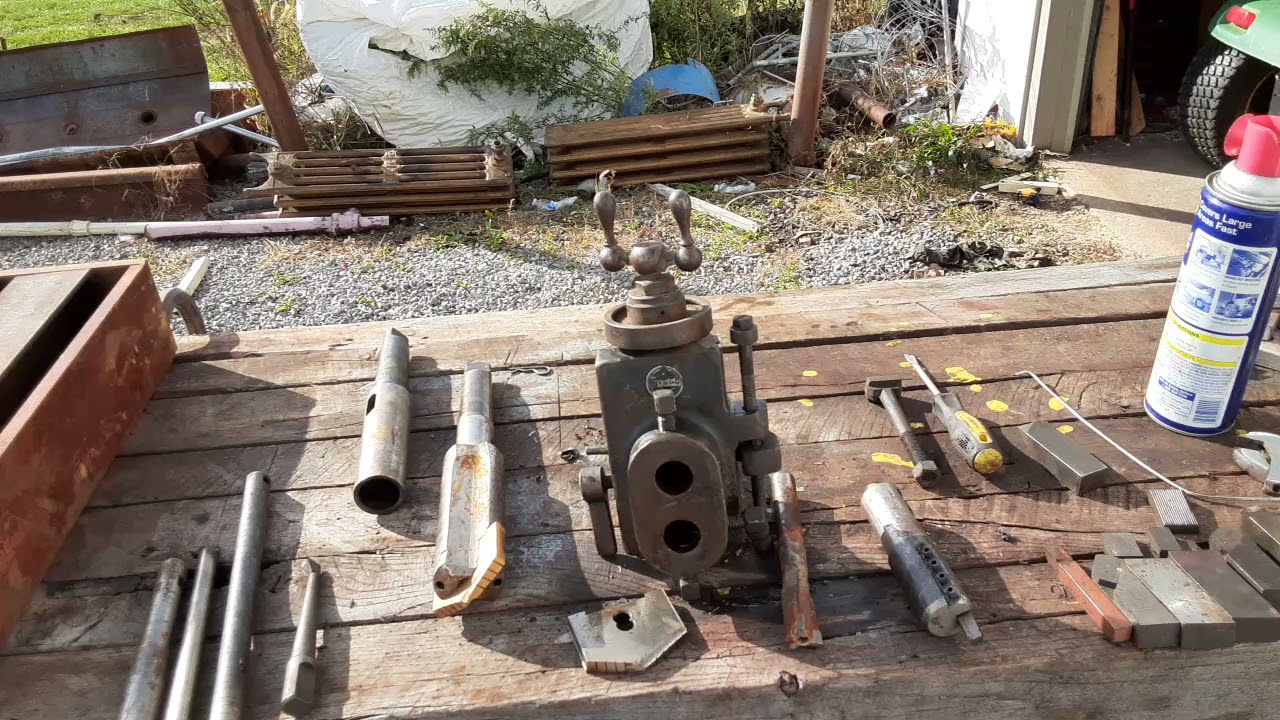 Warner and swasey M1865 slide tool holder. and other misc bits