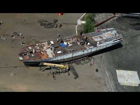 Deep Water Recovery ship breaking grinding up the shoreline with the ...