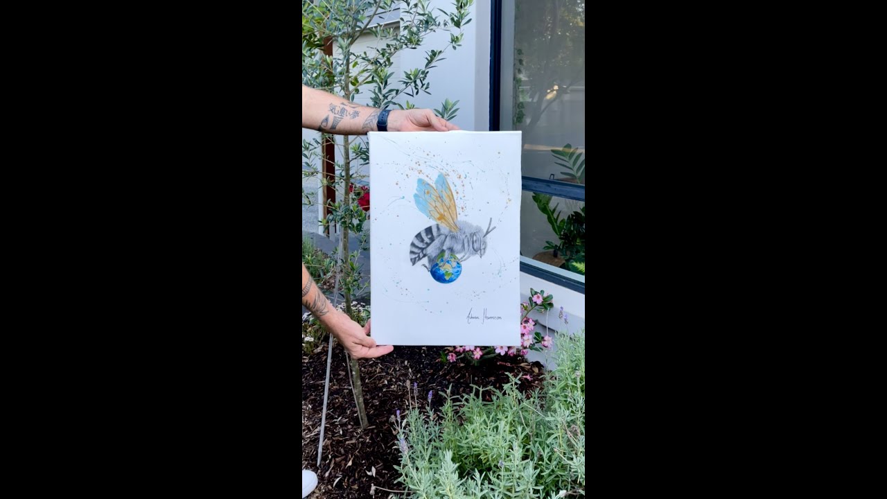 Ashvin Harrison Artist Creating A Bee On World Climate Change Themed Painting
