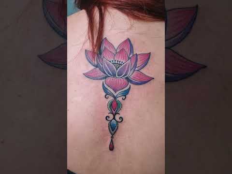 The Beauty of Ornamental Ink With Lotus Flower Tattoo Masterpiece!