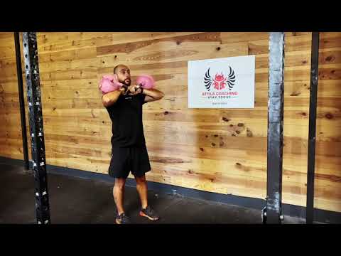 Dual Kettlebell Front Rack Walking Lunges | myworkouts.io