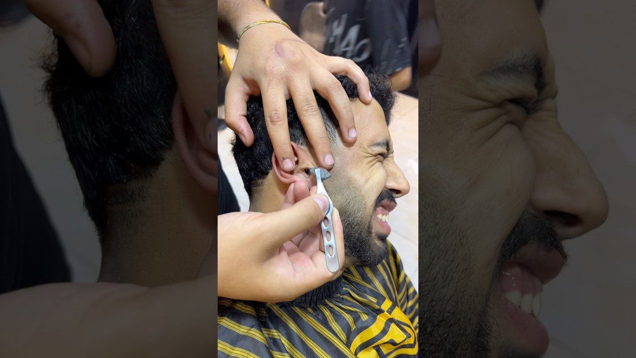 Removing ingrown hair from the ear✂️😂#explore #barber #eidmub #viral #haircut #barbershop #ukbarber