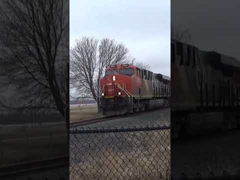 CN engine leads a Canadian Pacific freight train Muscatine, IA 3/24/2022