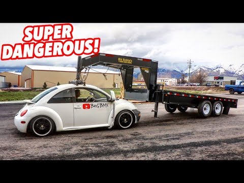 Watch a 1998 VW Beetle TDI Pull a Gooseneck Trailer With Its Roof ...