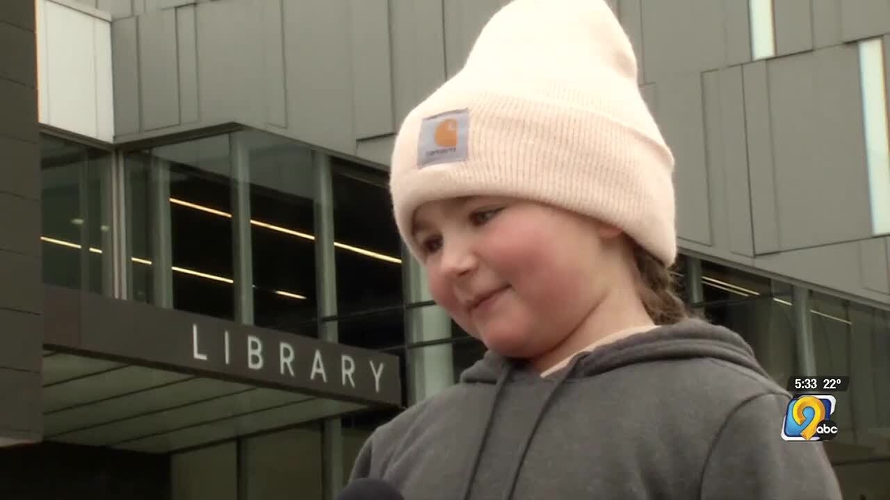 Couple hands out food to people experiencing homelessness every week