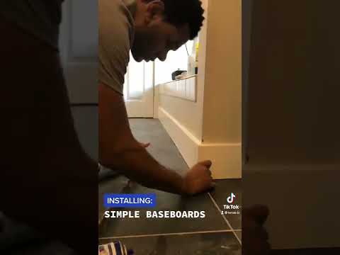 Installing baseboards in a bathroom! #diy #satisfying #shorts