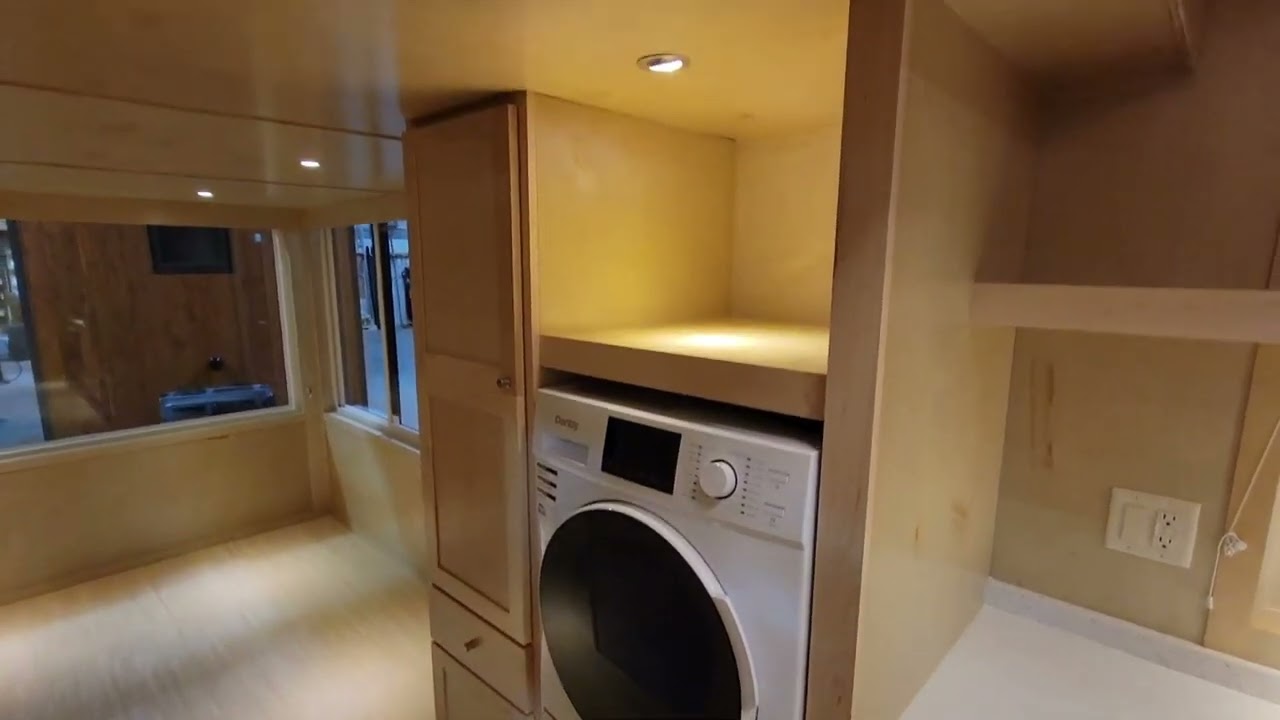 This Tiny House Is All-Electric and Hides an Entire Second Level ...