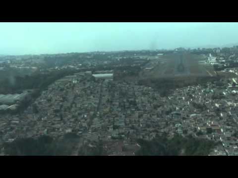 COCKPIT VIEW OF APPROACH AND LANDING AT GUATEMALA LA AURORA AIRPORT
