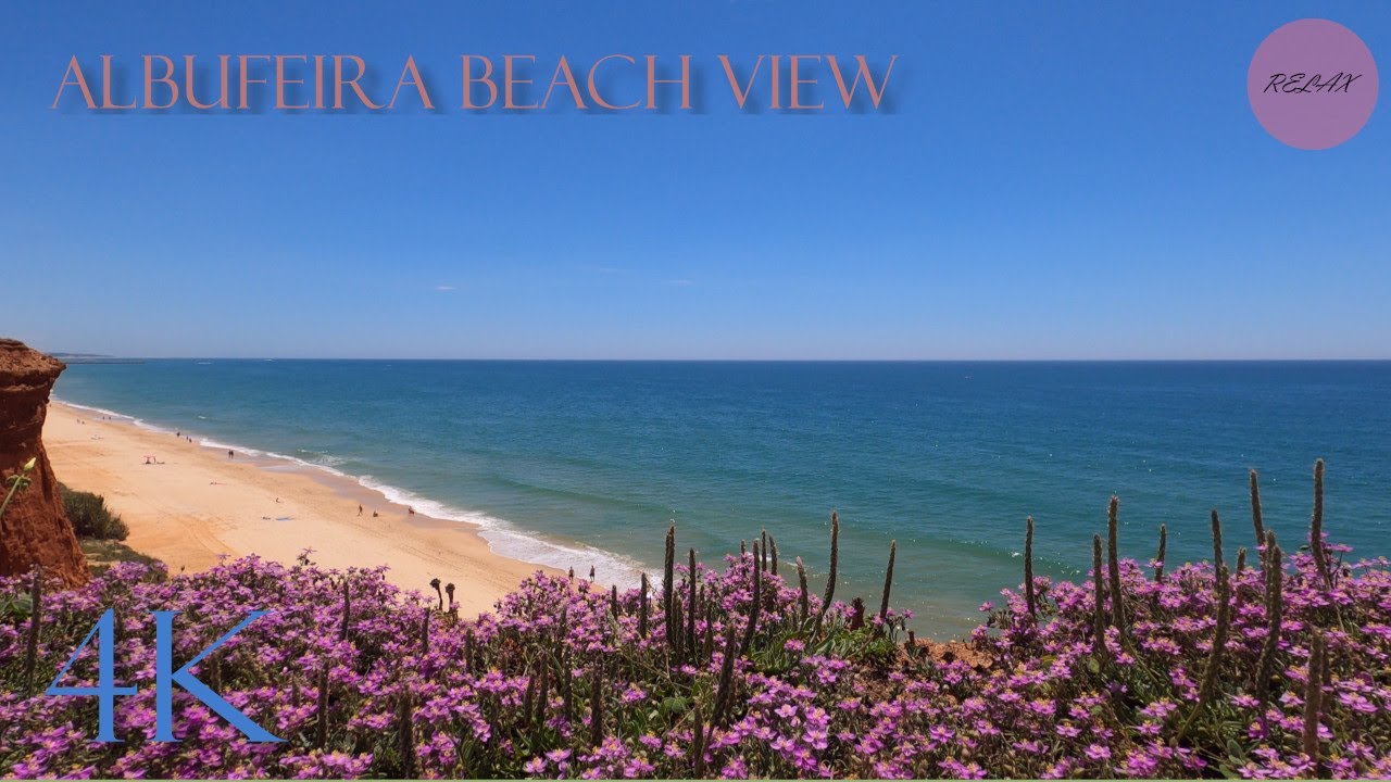 Seaside Cliff overlooking a beautiful beach in the south coast of Portugal in 4K UHD
