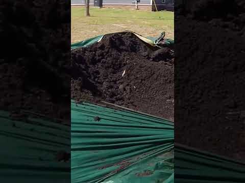 Adams Family Homestead unloads garden mushroom compost with john deere 3025e