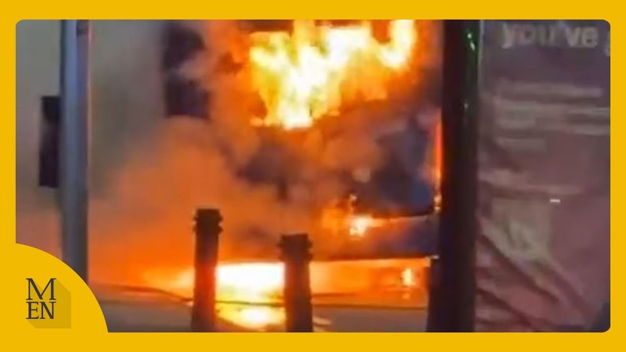 Dramatic video shows moment bus bursts into flames on busy road ...