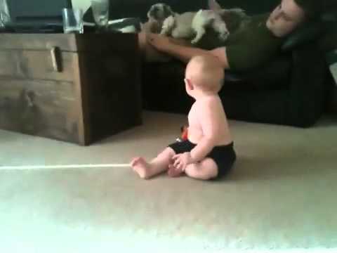Jack crawling to the green paper