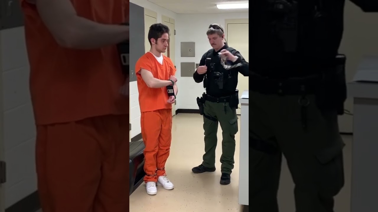 Handcuff with black box and belly chains