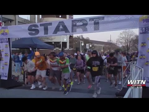 Runners lace up shoes for The Pirate 10 Miler in Greenville