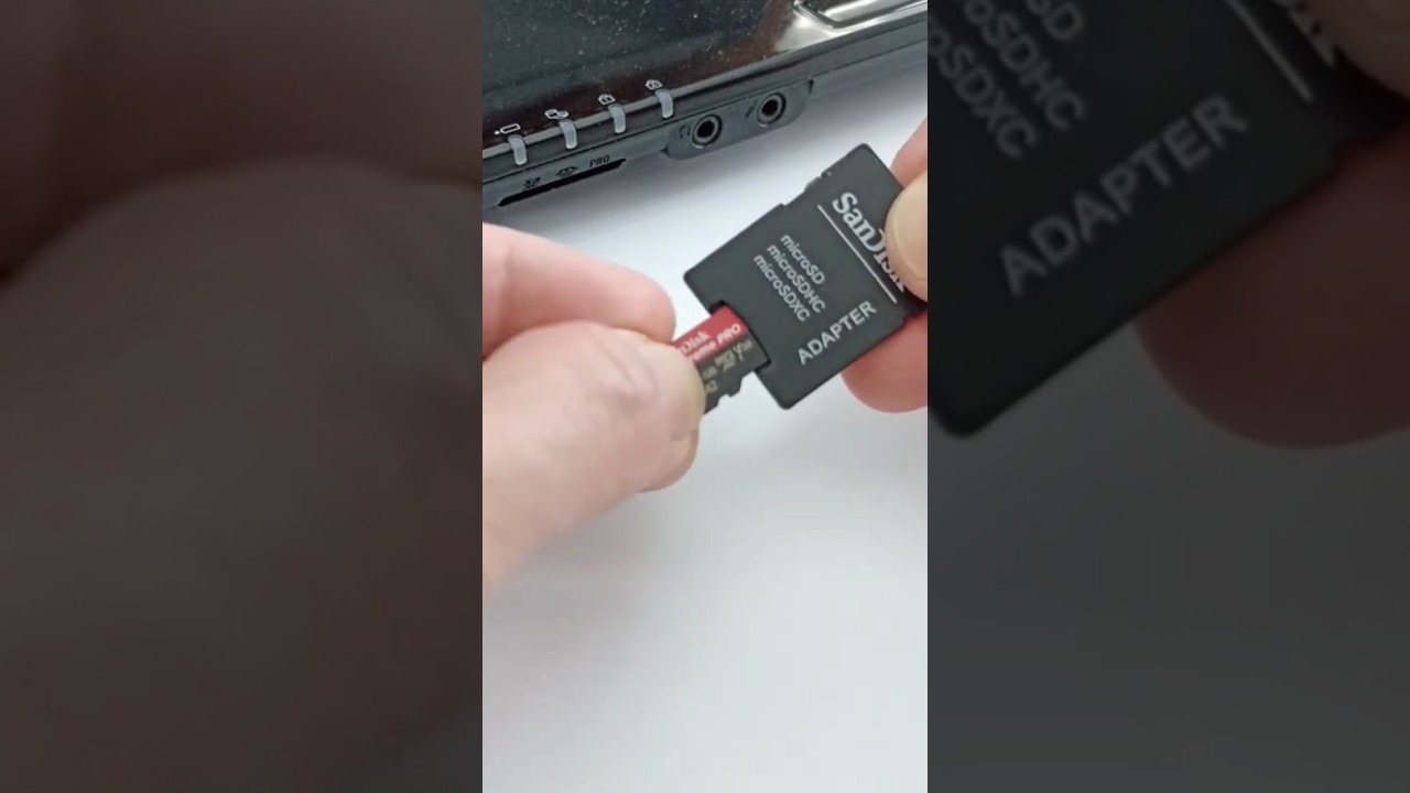 Inserting a micro SD into the adapter to be plugged into the SD slot on a laptop like this #shorts