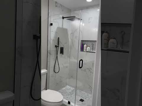The black accents really make this shower door pop!