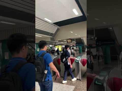 Singapore people into MRT station