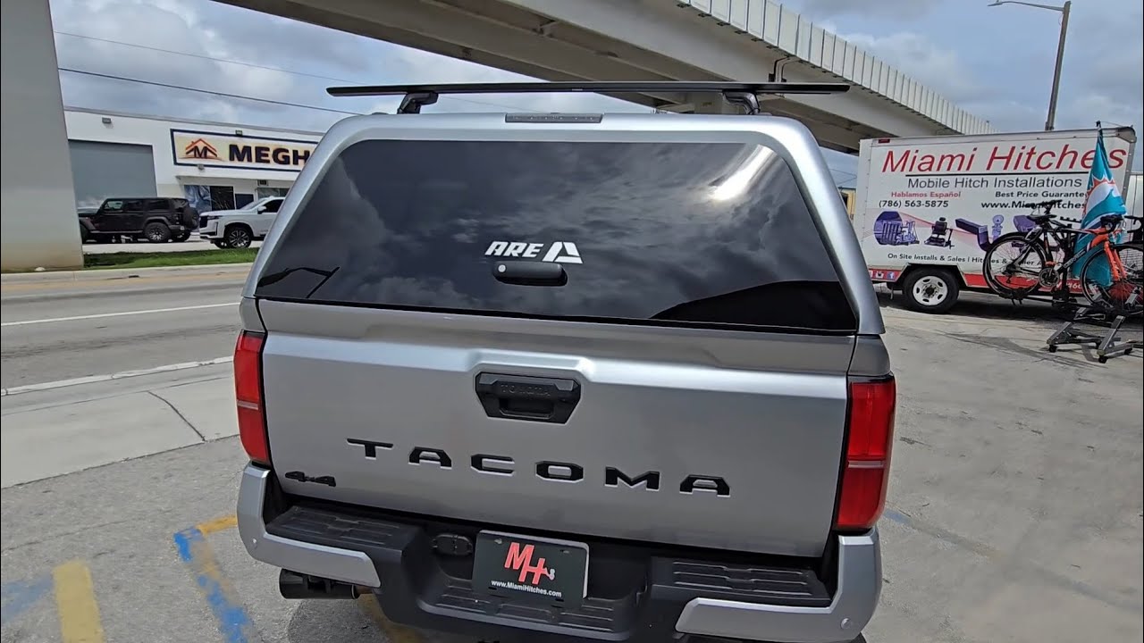 2024 Toyota Tacoma with an A.R.E. CX Evolve Bed Cap Enhancement