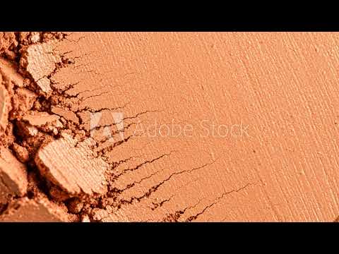 Close-up look at pressed powder revealing texture and color variations - Stock Footage