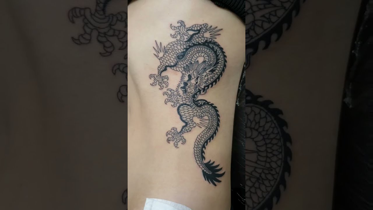 12 Amazing Dragon Tattoo designs .