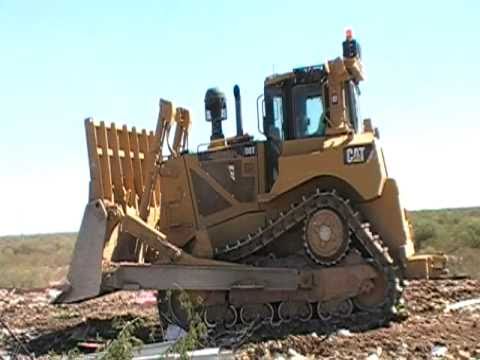 Caterpillar D8T Pushing Garbage And A Little 836 Compactor Action