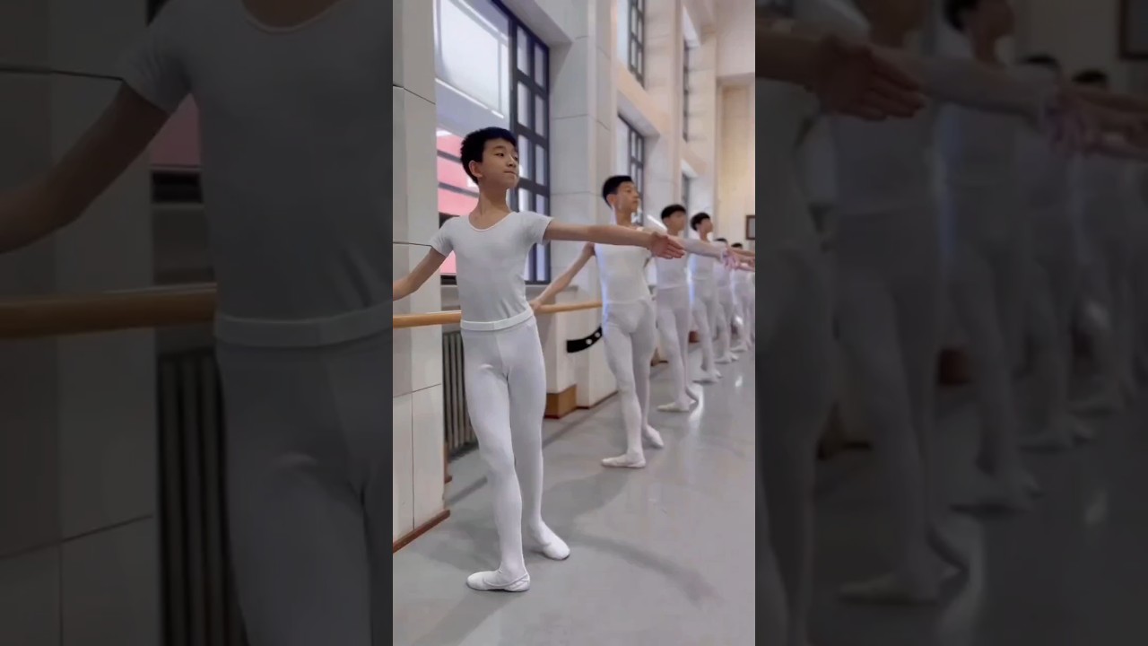 boys ballet class with full white tights