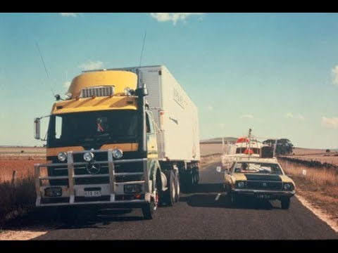 Semi runs down car and boat