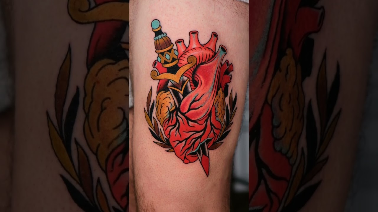 Heart and dagger traditional color tattoo by David Bruehl. #tattoo #tattooartist #art