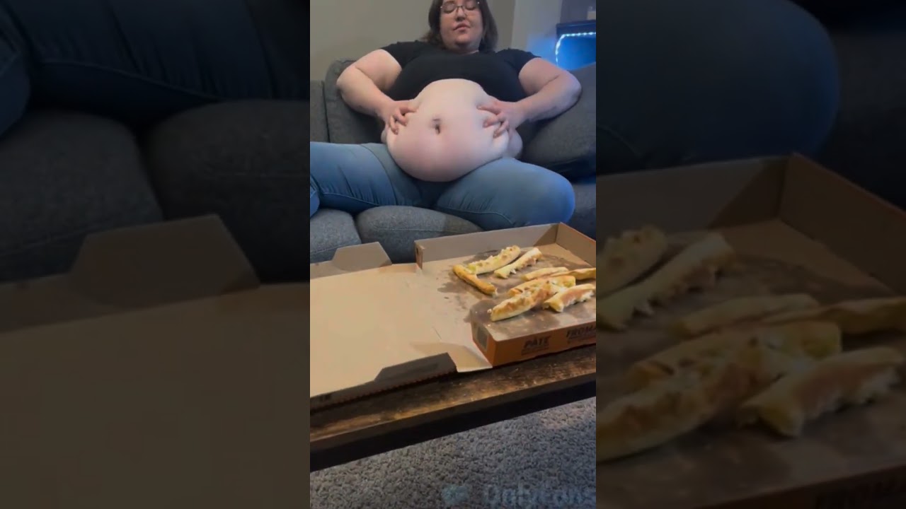 Very fat girl eats to much and finds out just how heavy her belly is now