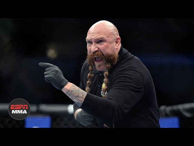 Who is the UFC referee with the trademark long beard?