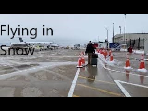 Never saw this | Columbia Missouri airport boarding | Unbelievable | Walk to the plane | Ramp | Snow