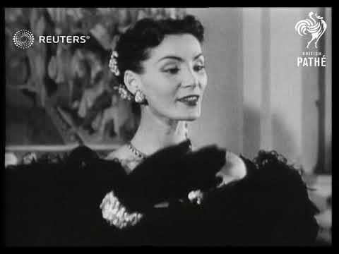 Fashion models model lavish Parisian jewelry (1950)