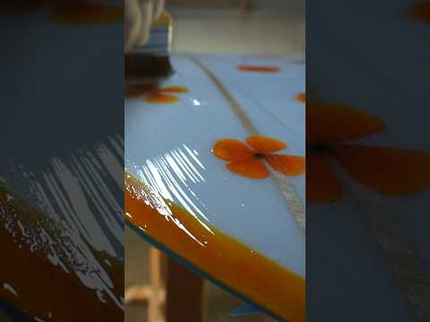 Glassing real poppies into a surfboard. Full vid on my channel. #surfboard #surfboardshaper #surf