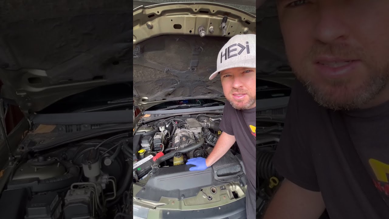 Band-Aiding the old VY commodore’s cooling system… again. Blown radiator hose