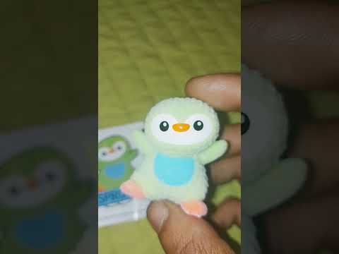 Opening a topps i love peguins blind bag