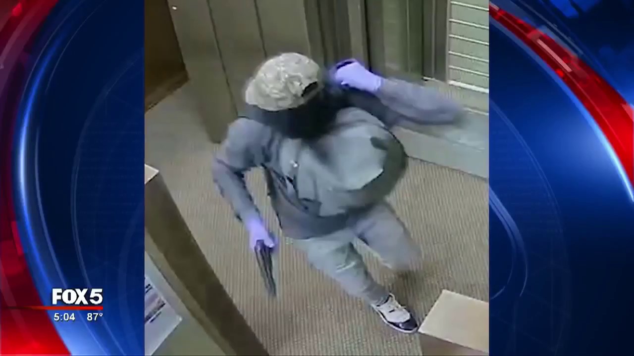 2 arrests made in bank robbery; search for more suspects