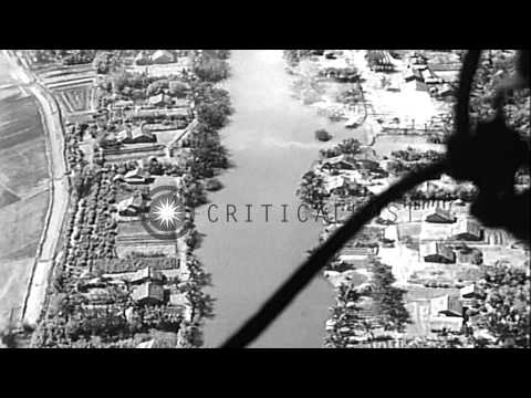 CH-21 helicopters fire rockets at Vietcong targets in Vietnam HD Stock Footage