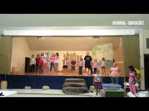 The cast of Sterling Miracle Players Kids Camp The Little Mermaid Jr. perform Under the Sea