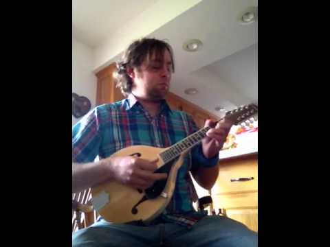 Cutch Tuttle playing cluck ol hen on a new savannah mandolin