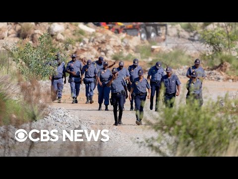 Rescuers pull survivors and bodies from abandoned South Africa gold mine