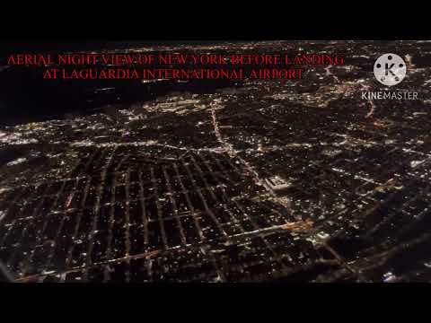 MAGNIFICENT AERIAL NIGHT VIEW OF NEW YORK BEFORE LANDING AT LAGUARDIA INTERNATIONAL AIRPORT