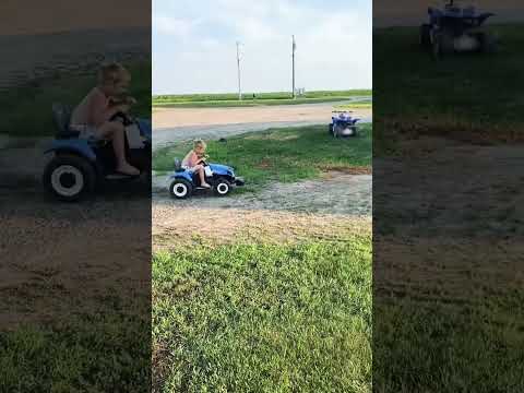 Practicing his pit maneuvers and defensive driving techniques! #kids #summer #tractor #fyp #driving