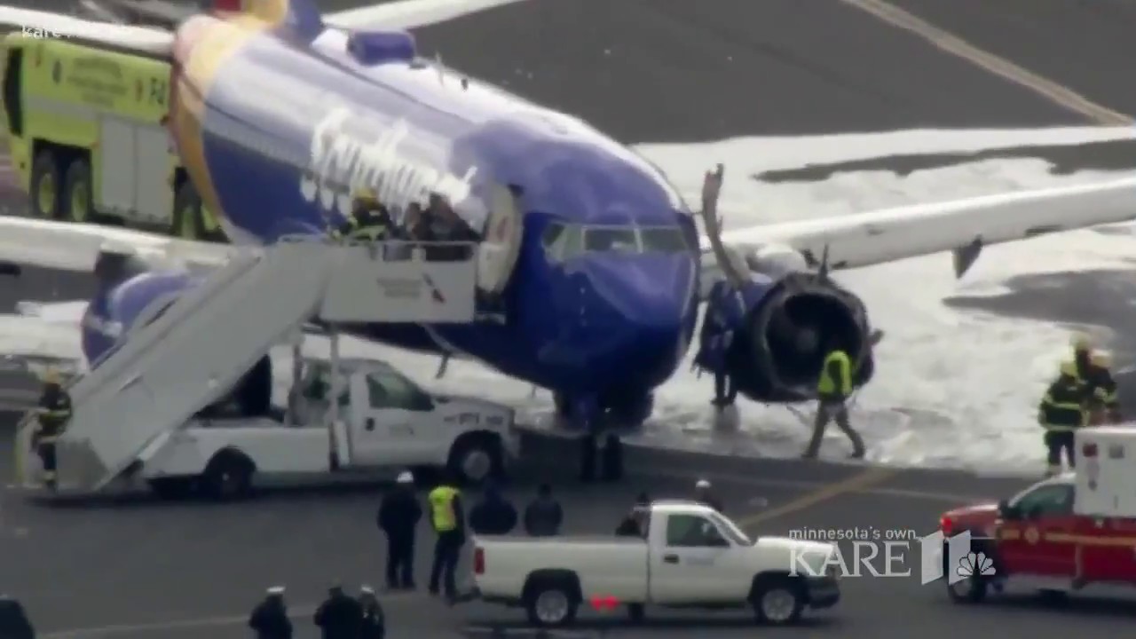 Mother of 2 dies after being wedged in Southwest plane window