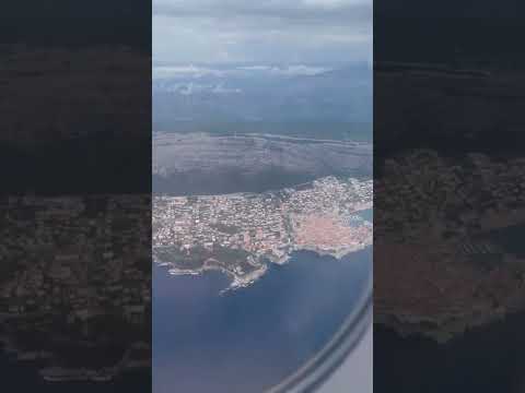 Plane flying over into Dubrovnik, Croatia