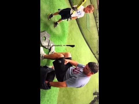 Carson hitting lesson with Mike Macfarlane.